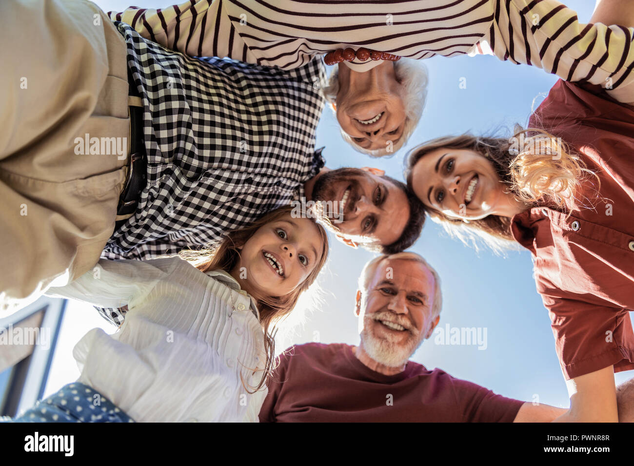 Playful little girl making funny faces on camera Stock Photo - Alamy