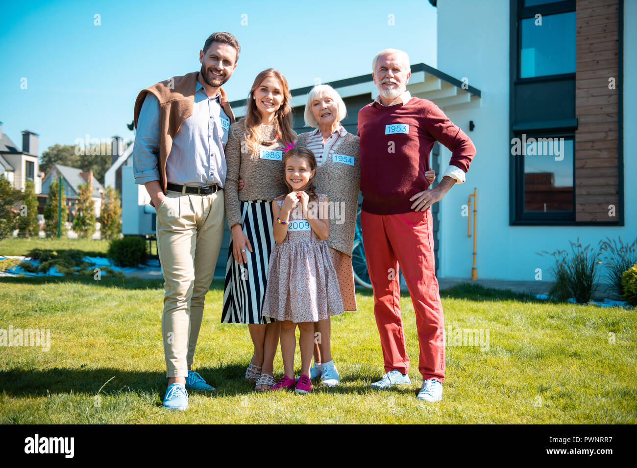 Handsome young man spending time with family Stock Photo - Alamy