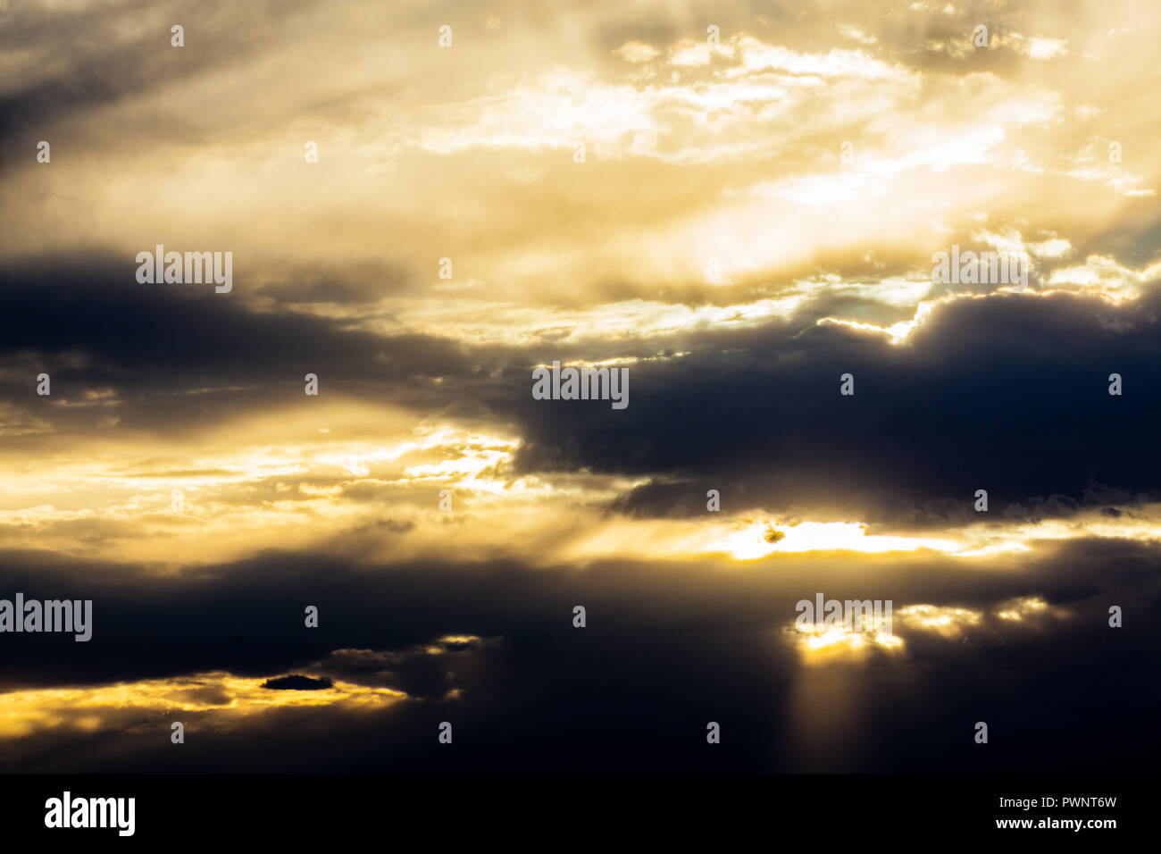 Sunset through beautiful religious clouds in the Sangre de Cristo ...