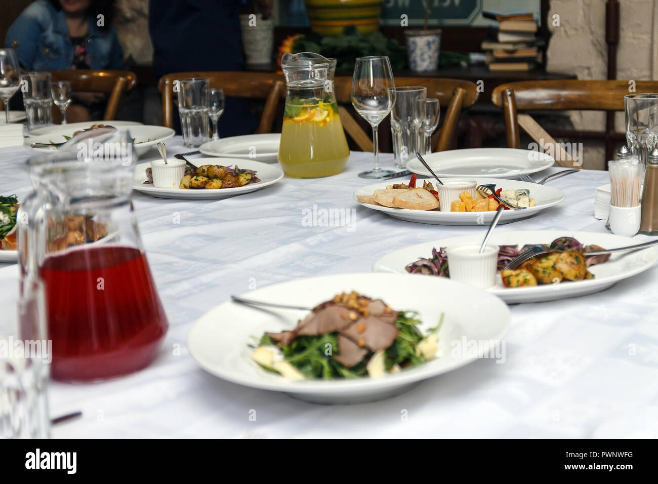 Meals with food are exhibited on the table in the restaurant. Laid ...