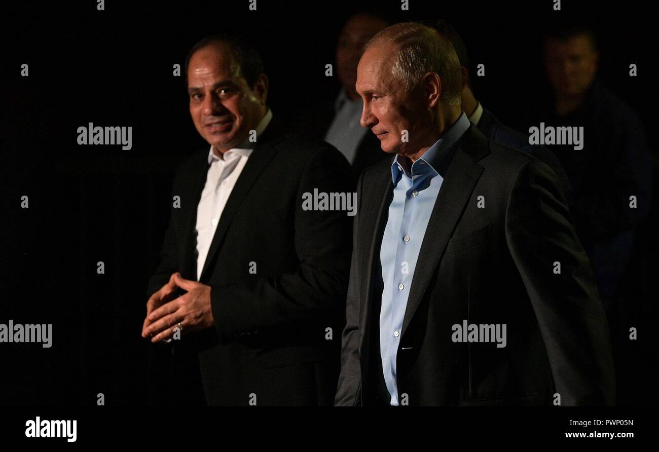 Russian President Vladimir Putin walks with Egyptian President Abdel ...
