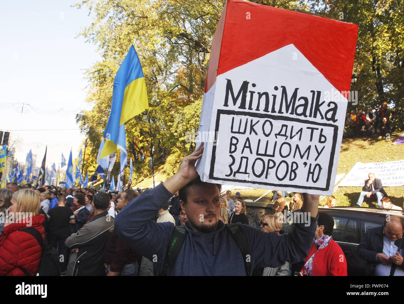 Kiev, Ukraine. 17th Oct, 2018. A protester carry a placard looking like ...