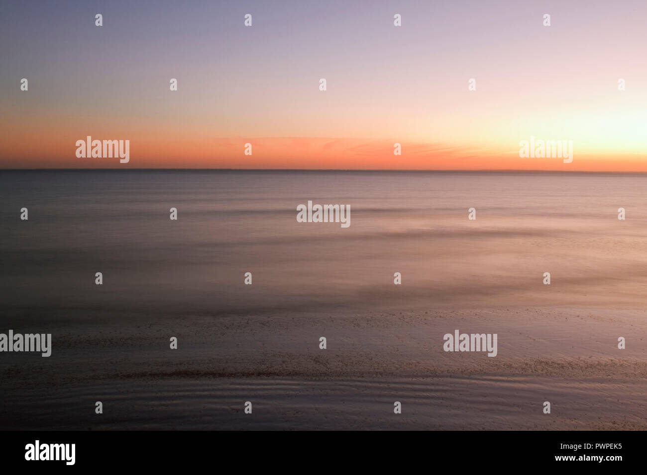 The sea at the sunset Stock Photo - Alamy