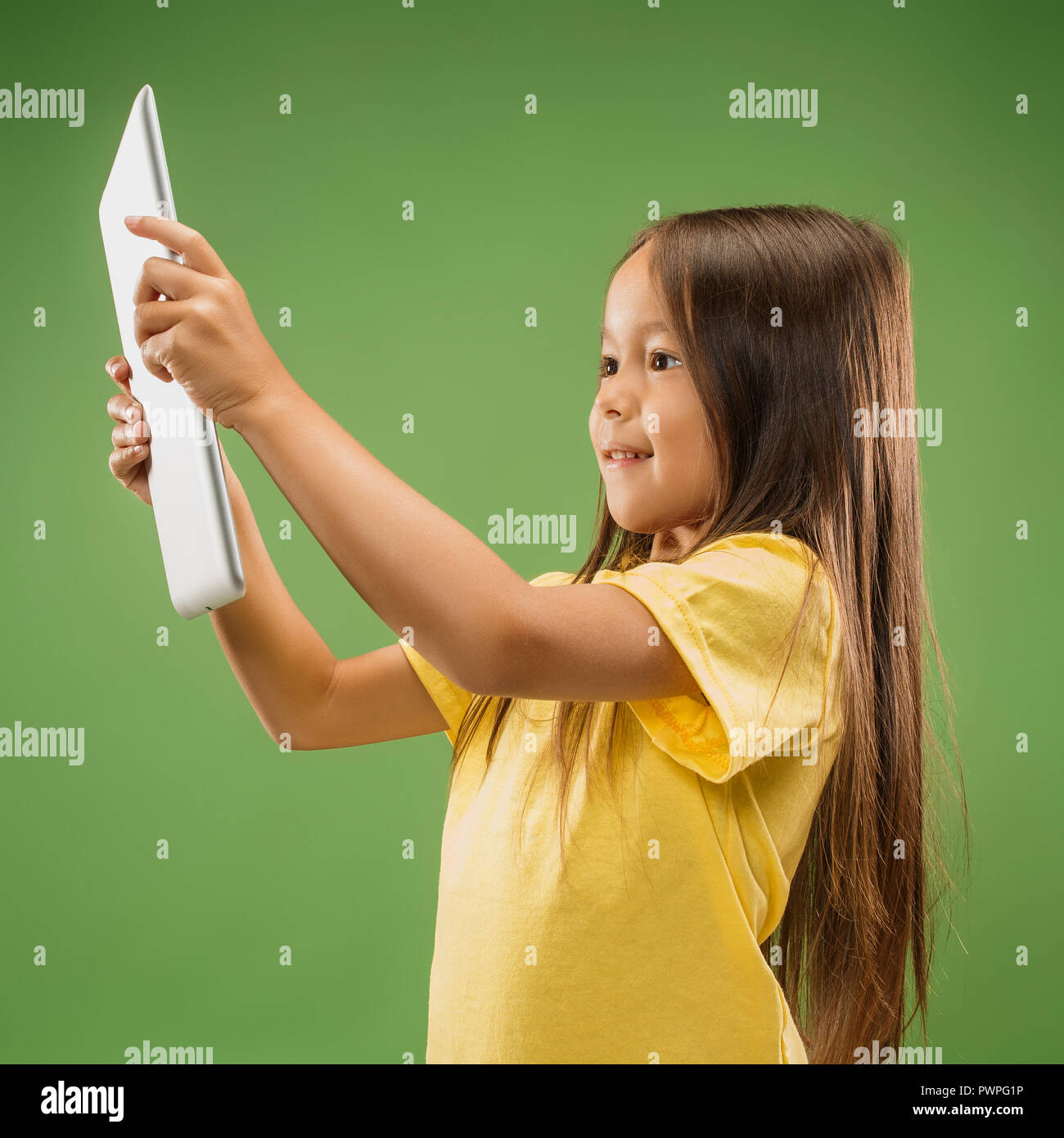 Teen girl with laptop. Love to computer concept. Attractive female half ...