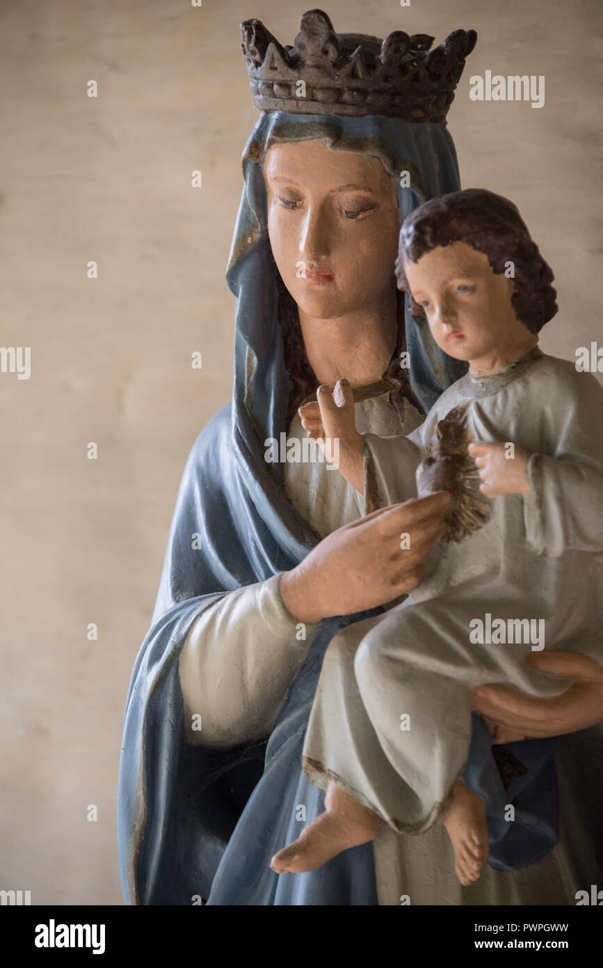 Colored statue of the blessed Virgin in a country church Stock Photo ...