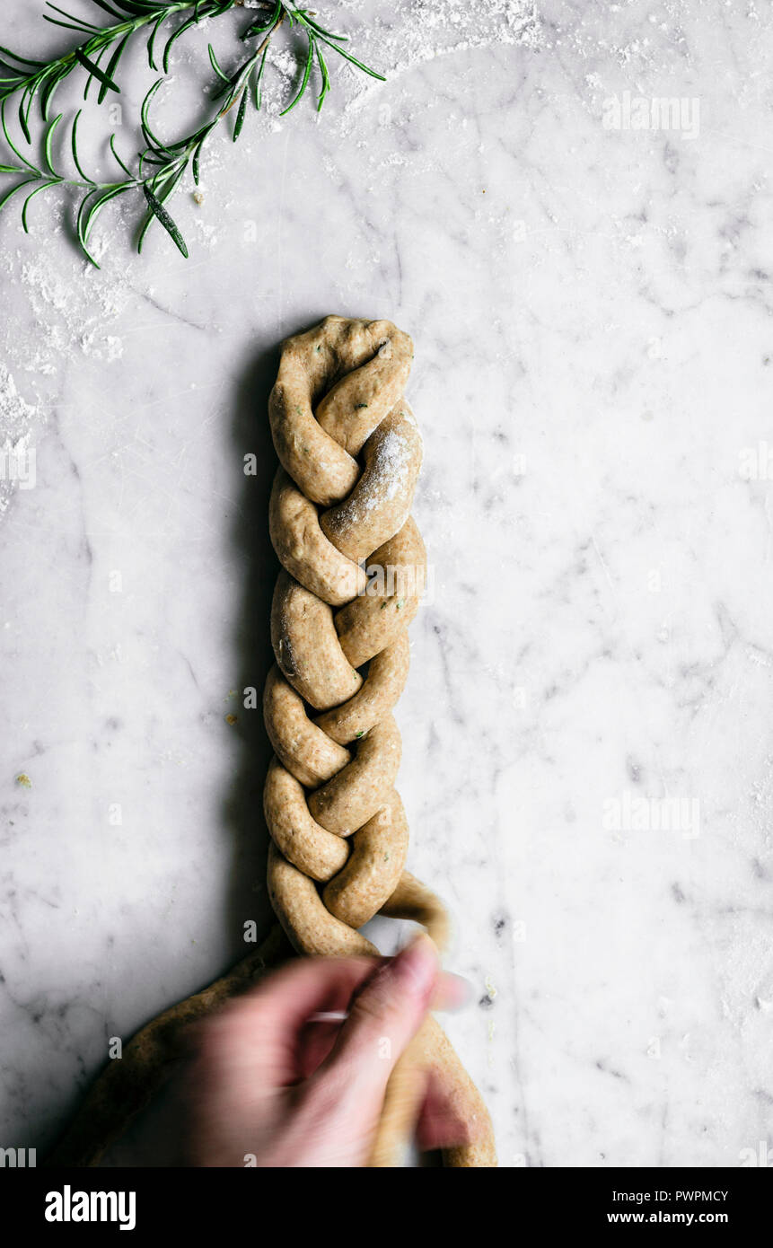 Rosemary, garlic, and olive oil plaited rye bread Stock Photo - Alamy
