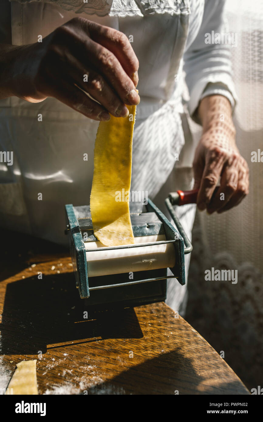 A woman making homemade pasta in the traditional way Stock Photo - Alamy