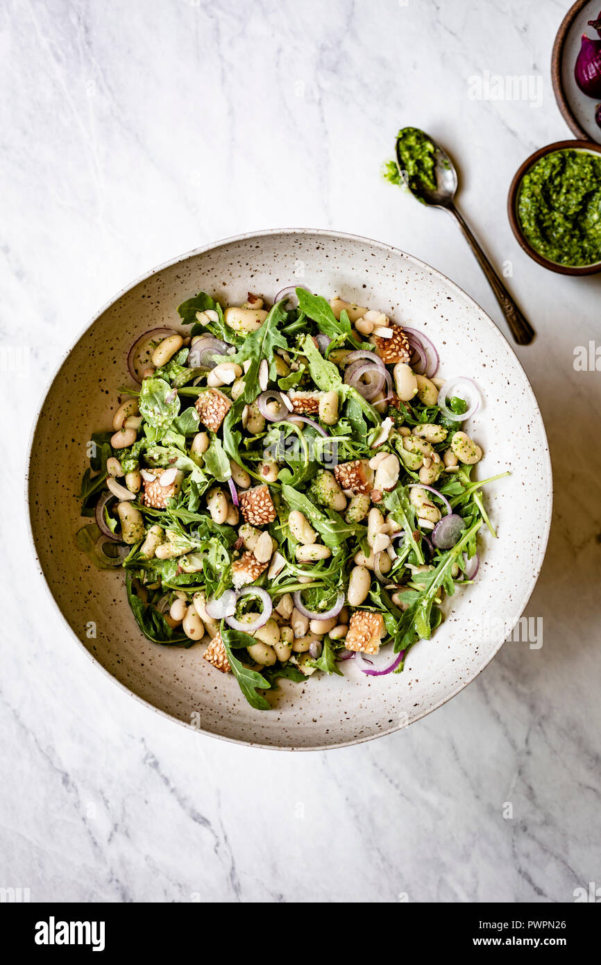 White Bean and Arugula Salad Stock Photo - Alamy