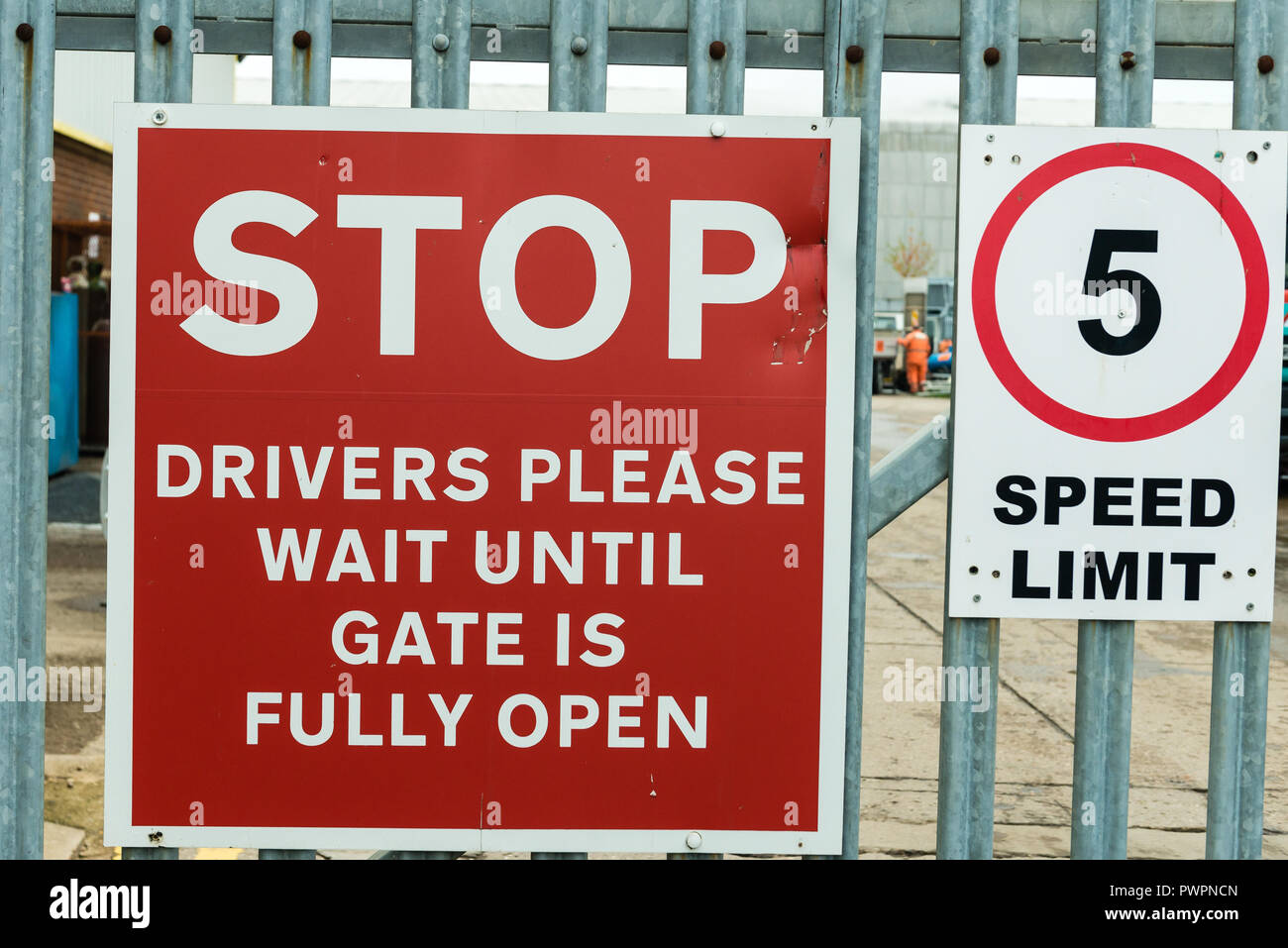 Stop drivers please wait until gate is fully open sign hi-res stock ...
