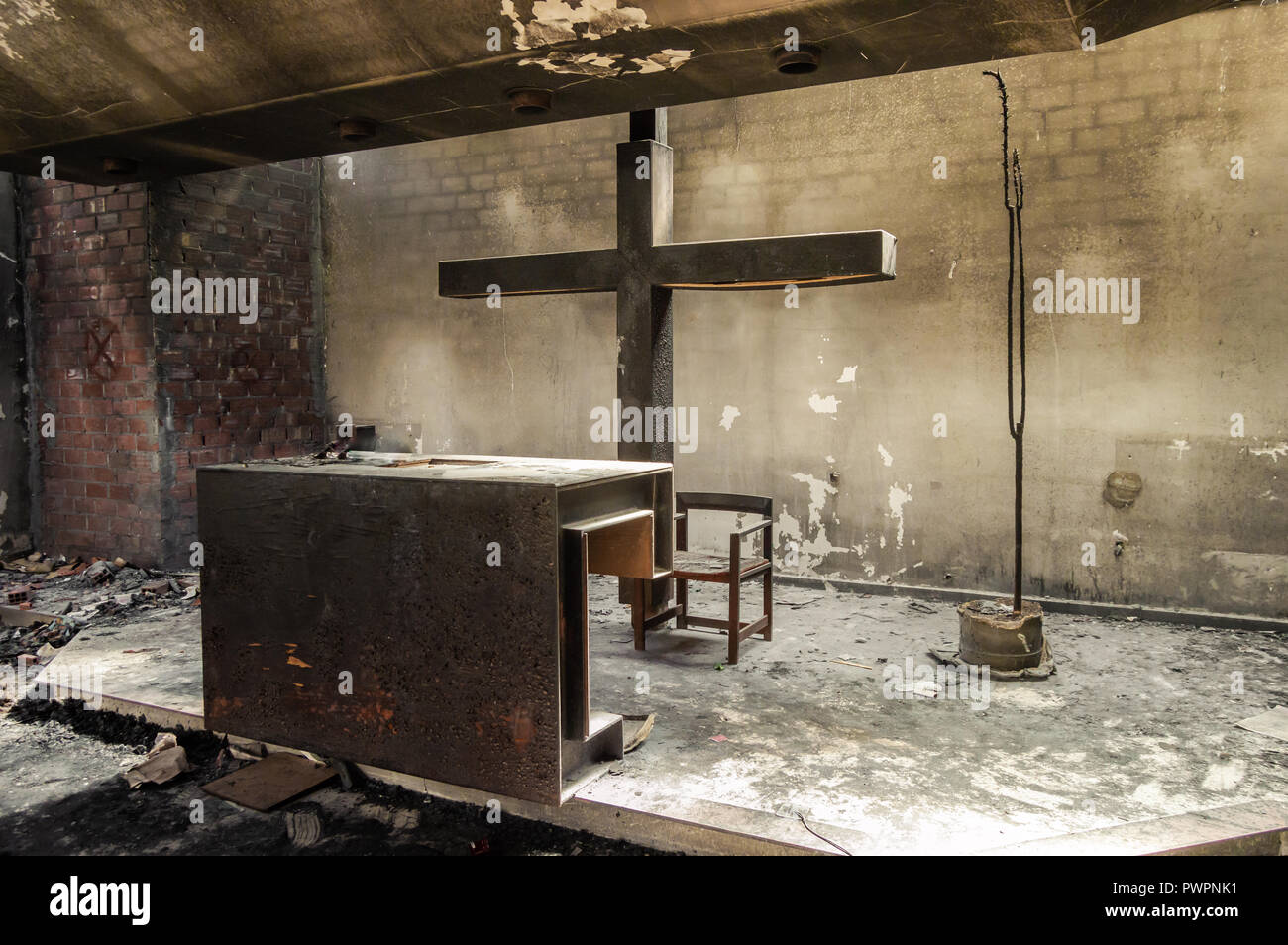 Beautiful altar and huge cross in a church or chapel destroyed by fire ...