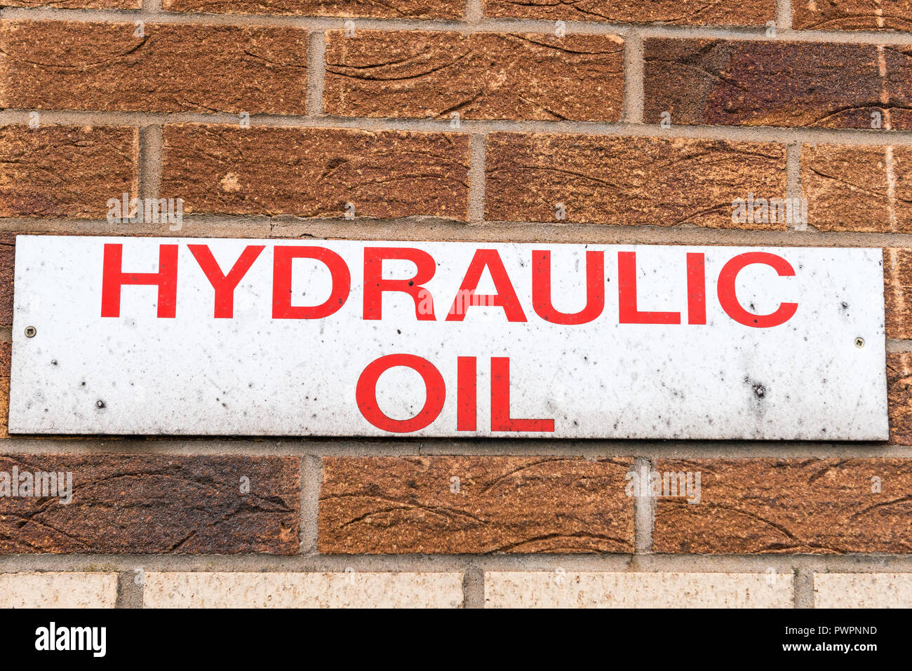 Hydraulic Oil sign on a wall Stock Photo - Alamy