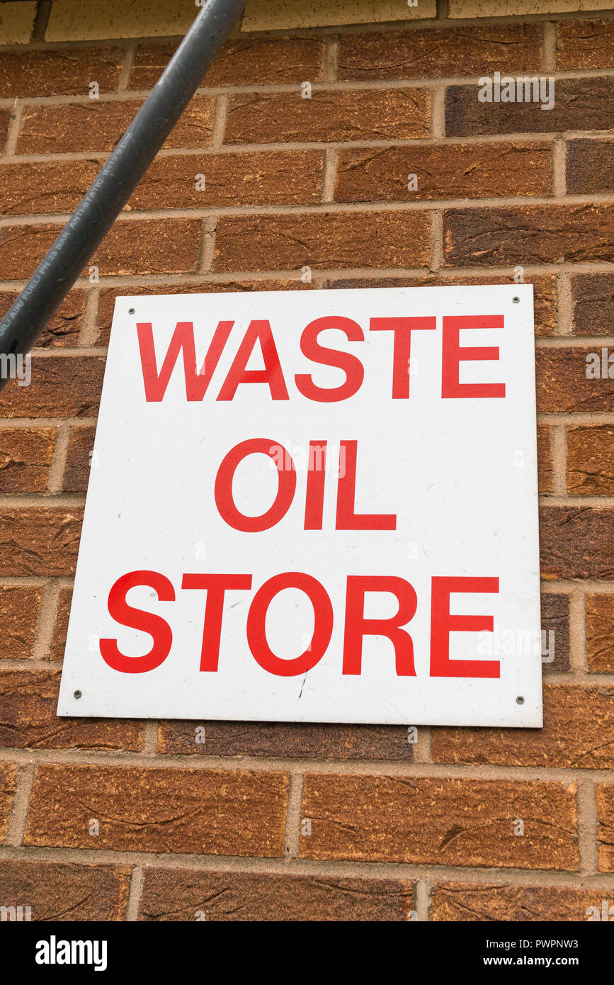 Waste Oil Store sign on a wall Stock Photo - Alamy