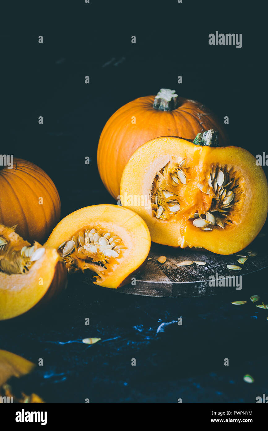Still life of Pumpkins , sliced and whole Stock Photo - Alamy