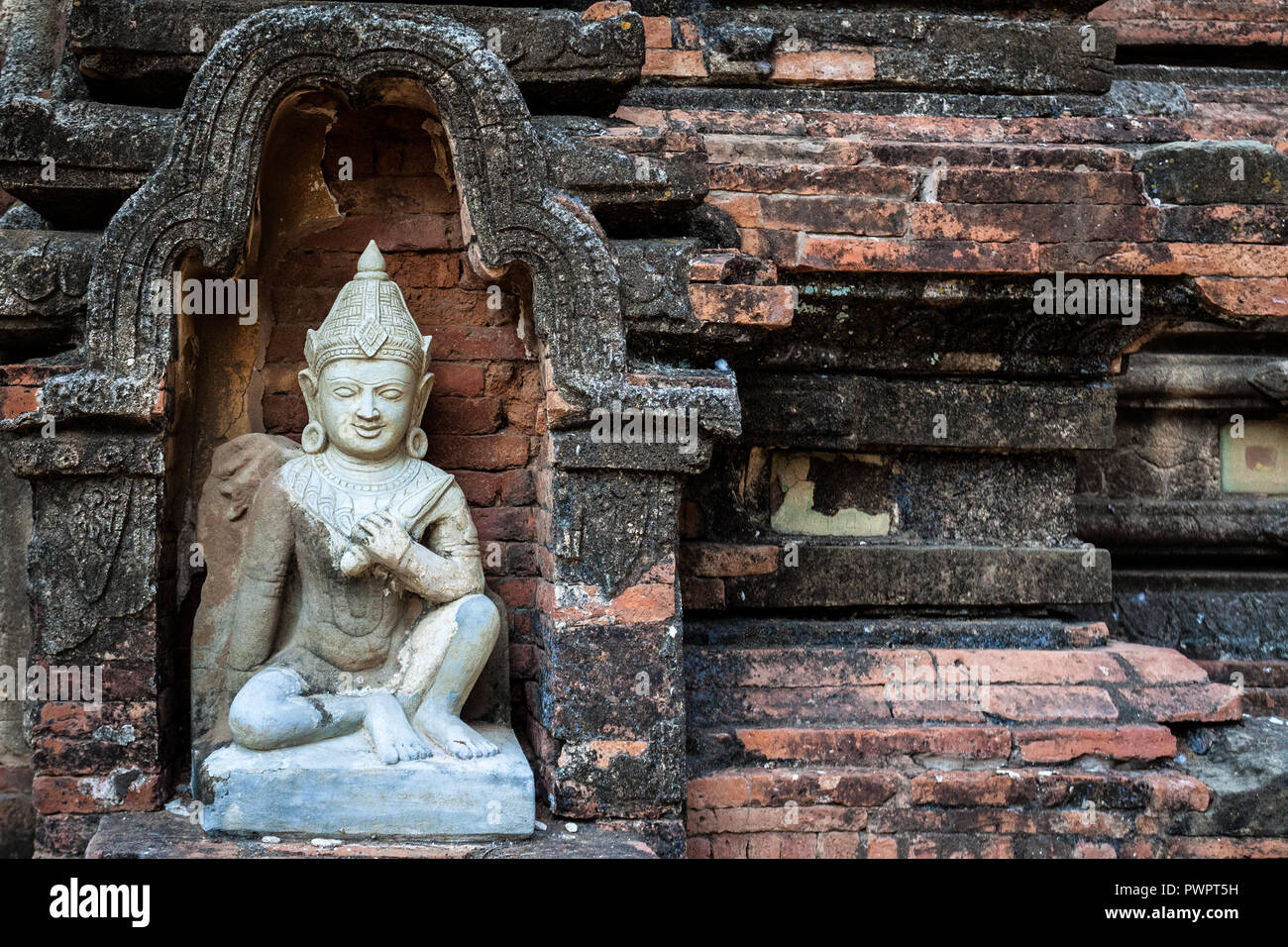 Statue in Bagan temple, Myanmar Stock Photo - Alamy