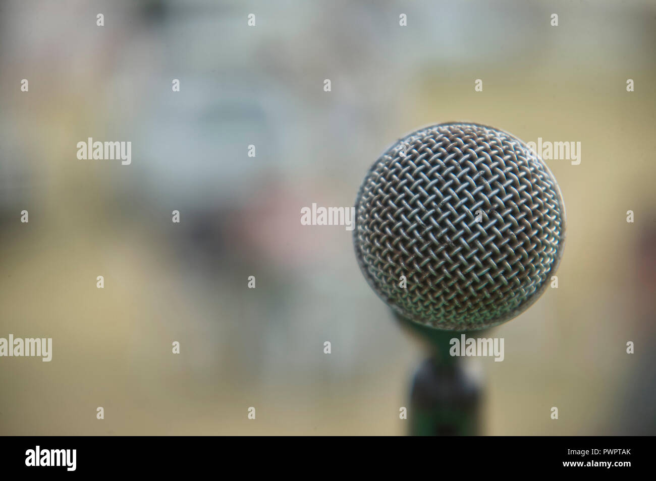 Detail of a microphone for singing taken in front view (view of the ...