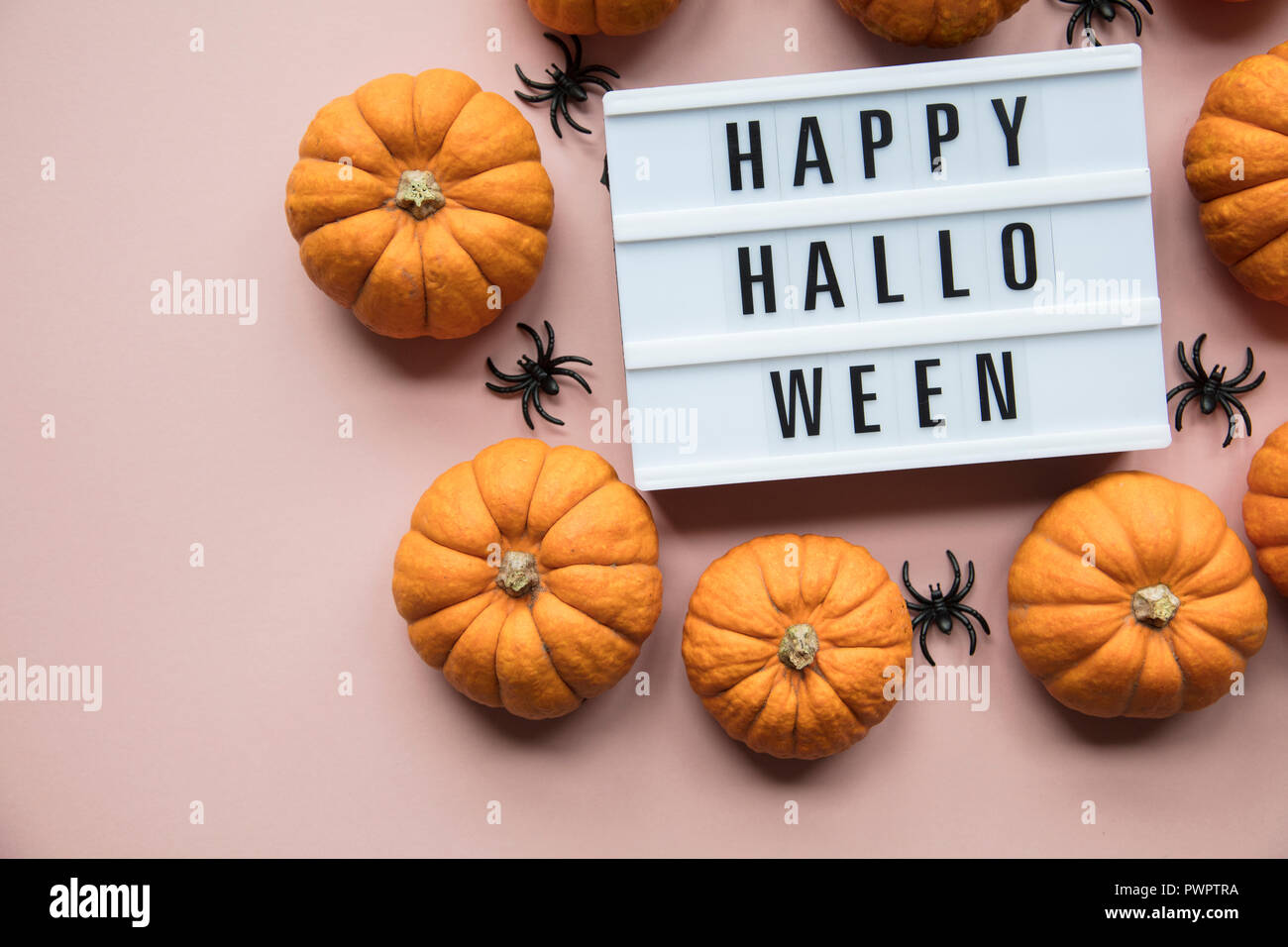 Happy halloween lightbox message with black scary bats Stock Photo - Alamy