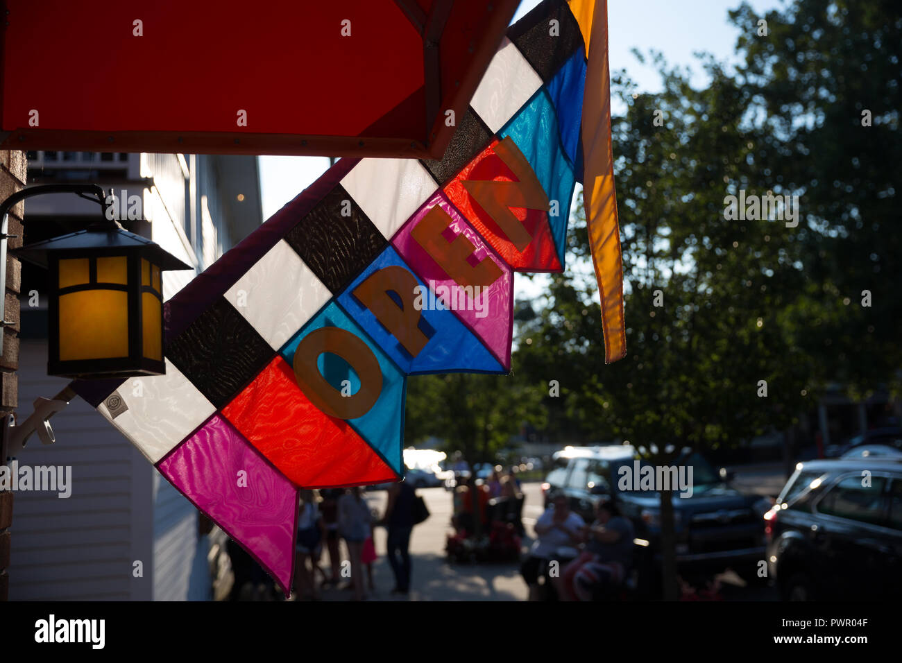 Colored open for business shop sign on a flag - Saugatuck, MI Stock ...