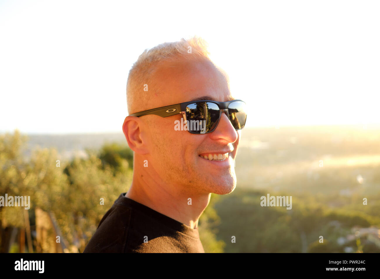 A smiling good looking man in his fourties Stock Photo - Alamy