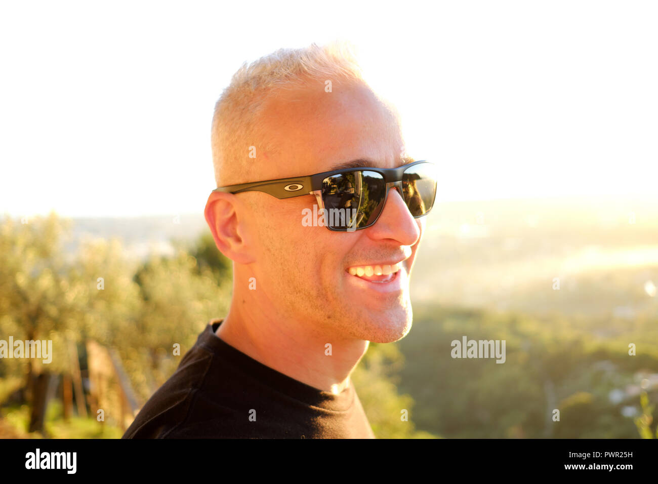 Smiling directly camera man hi-res stock photography and images - Alamy