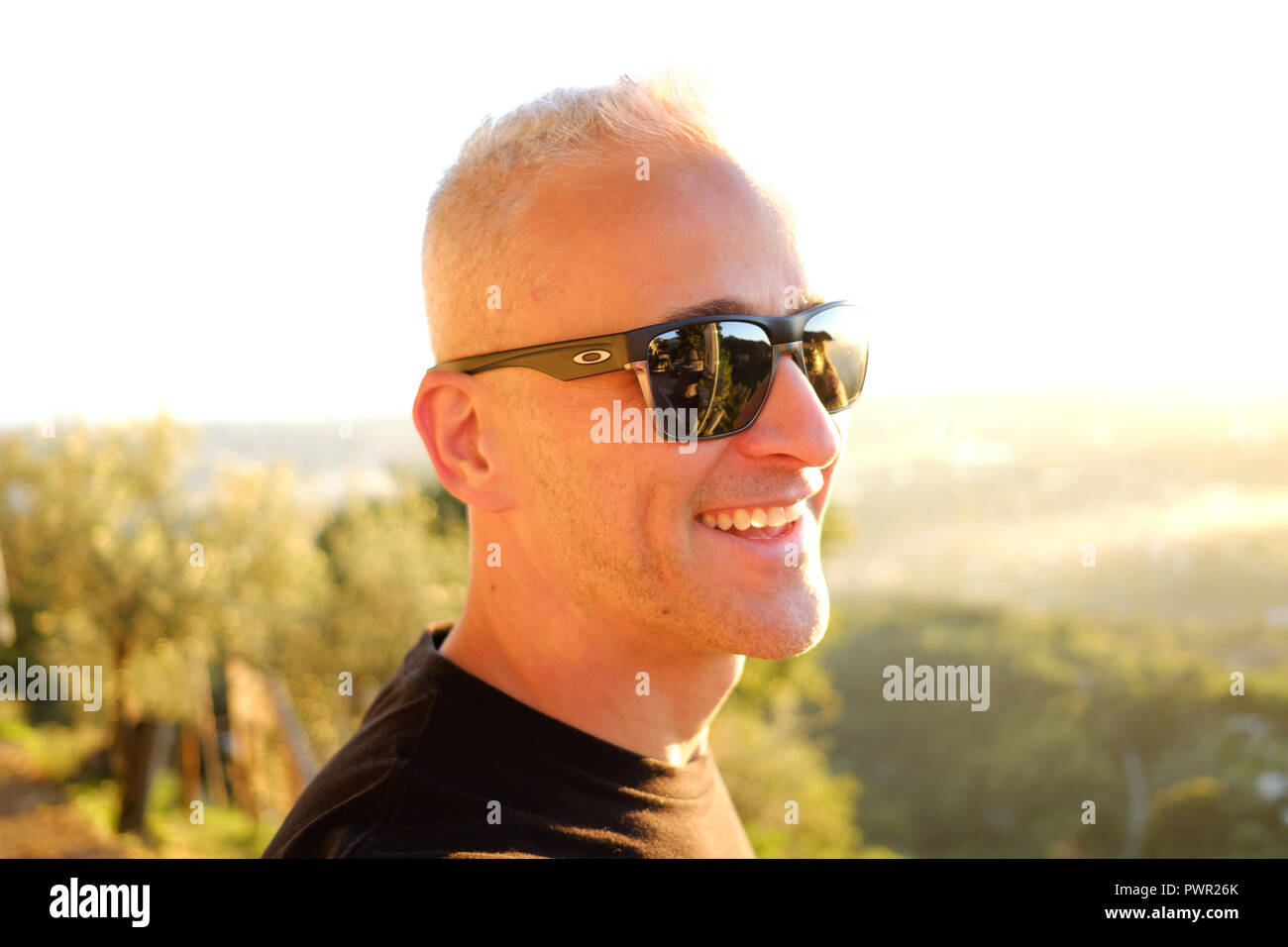 A smiling good looking man in his fourties Stock Photo - Alamy