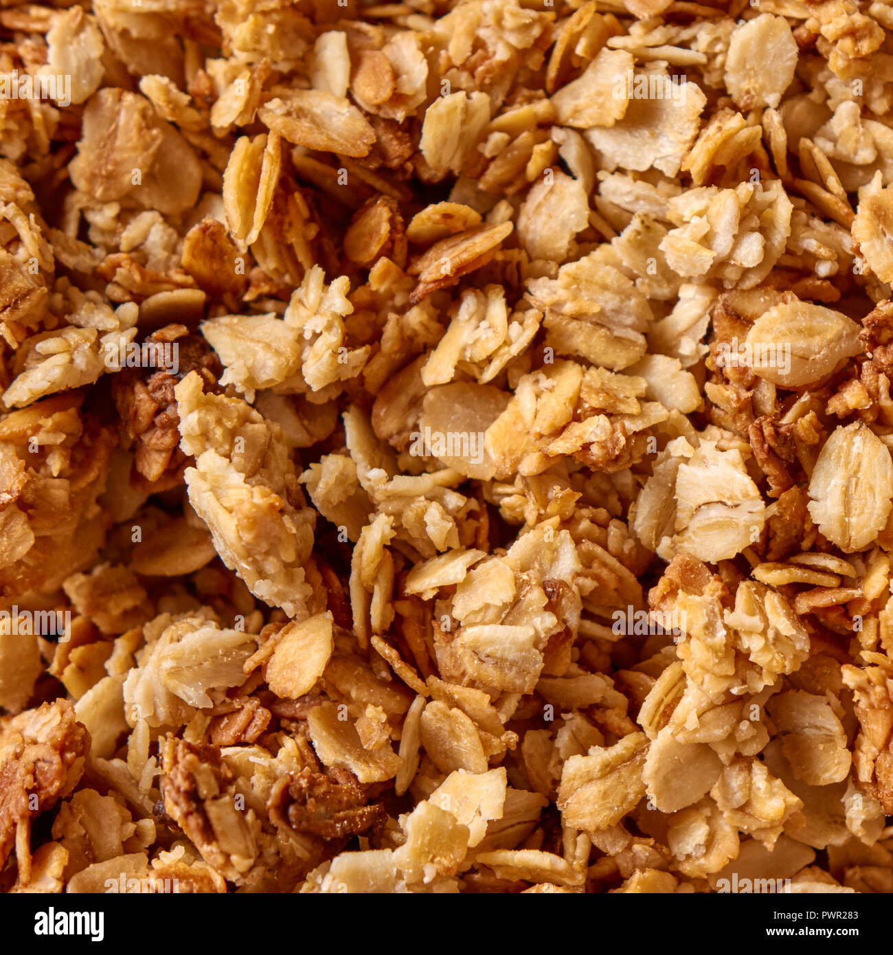 Close-up of homemade natural Oat Granola breakfast cereal as background ...