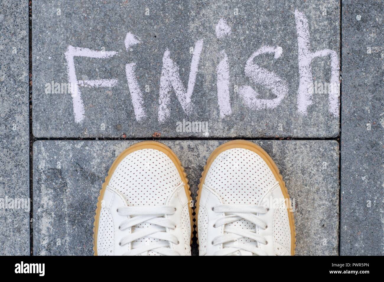 Female feet arrow text hi-res stock photography and images - Alamy