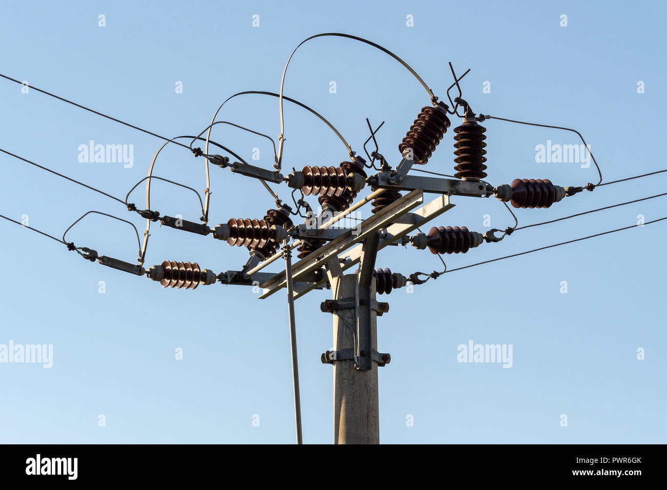 Electric column and wires of high voltage on blue sky background Stock ...