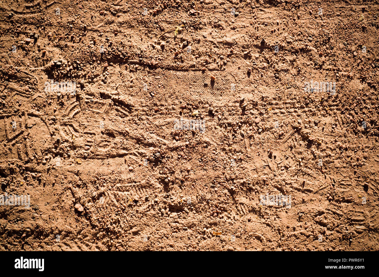 sandy path with cycle bike tire tracks with vignette. background ...