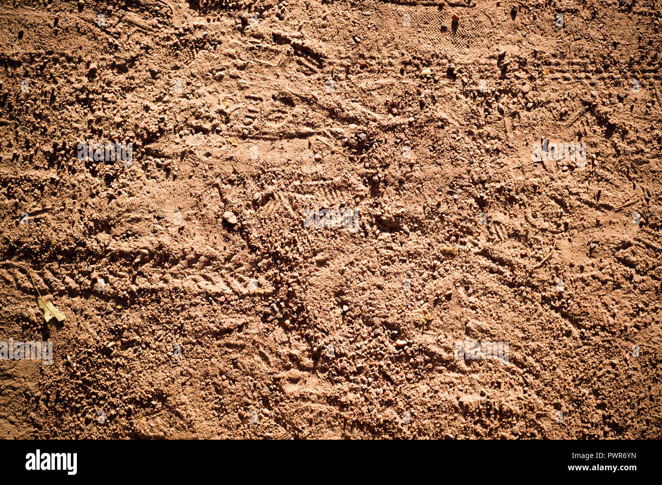 sandy path with cycle bike tire tracks with vignette. background ...