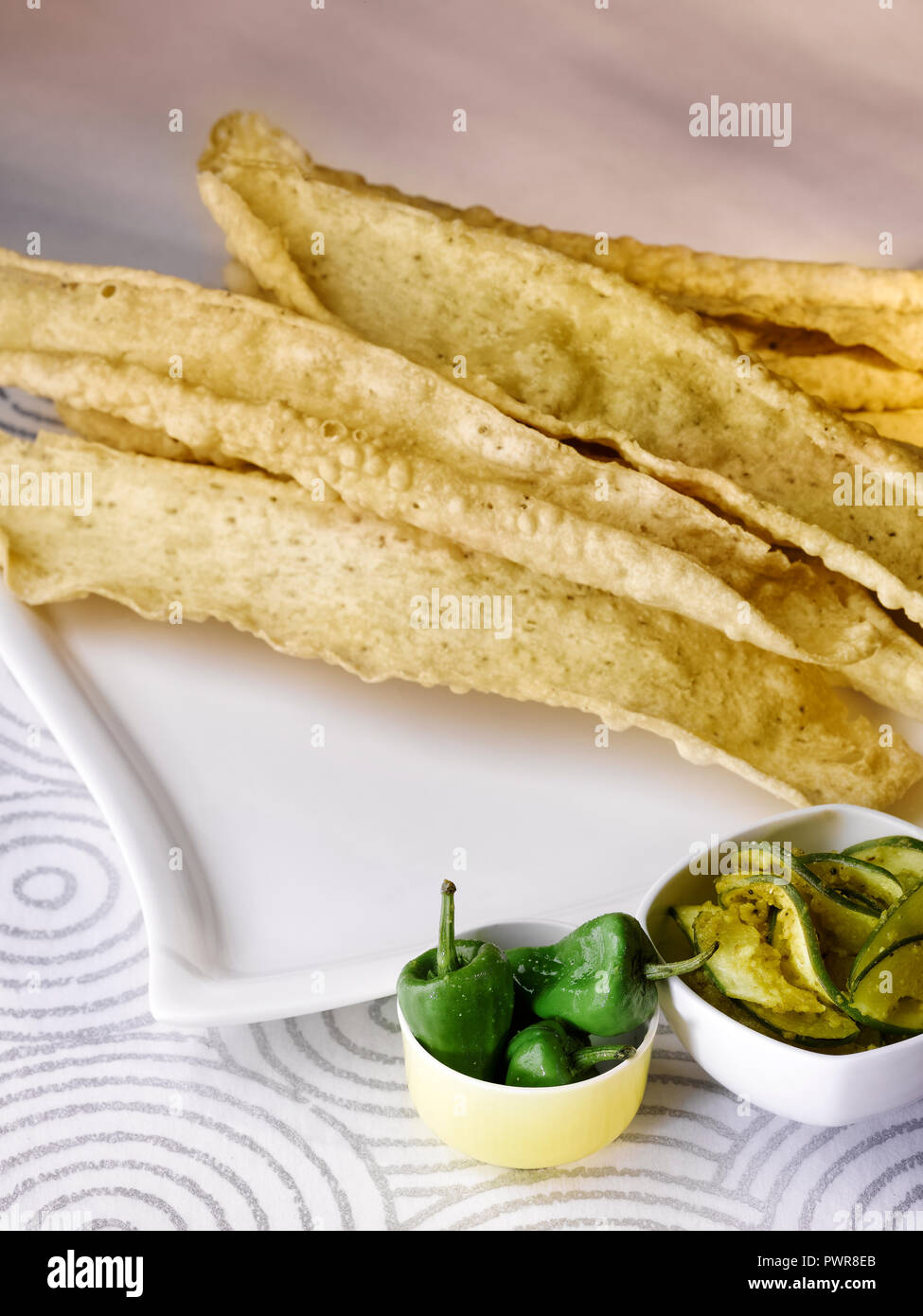 INDIAN SAVOURY MADE FROM FRIED GRAM FLOOR CALLED FAFDA GANTHIA GREEN ...