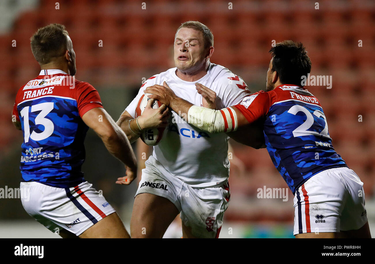 England's George Burgess is tackled by France's Mickail Goudemand (left ...