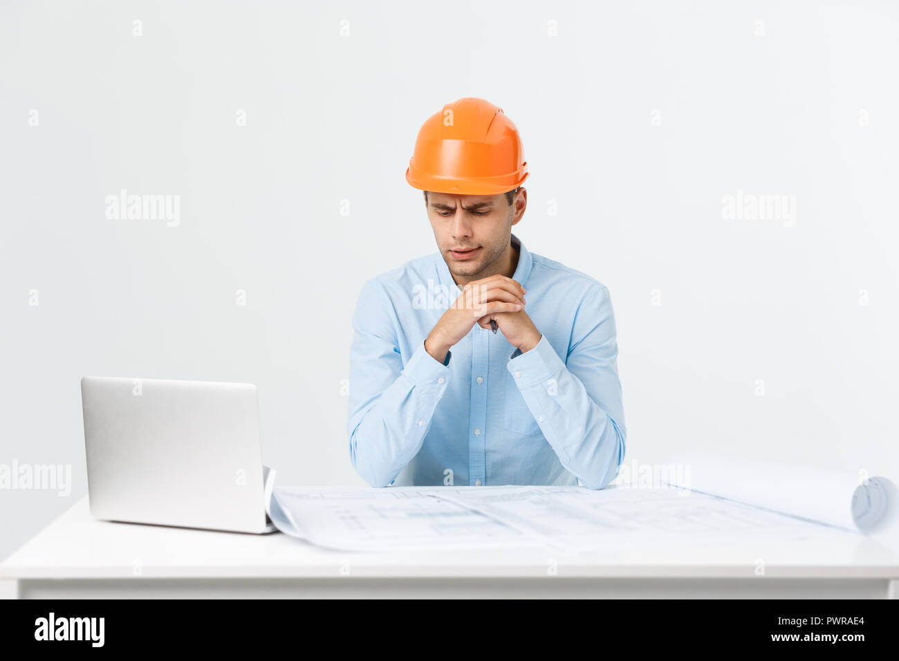 Young workman annoyed angry in furious gesture. Negative expression on ...