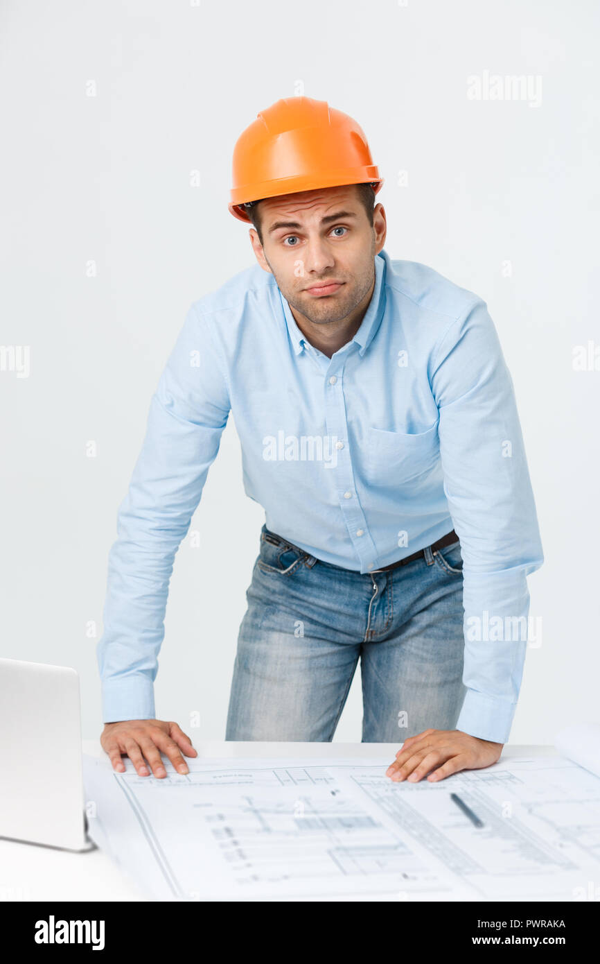 Young workman annoyed angry in furious gesture. Negative expression on ...