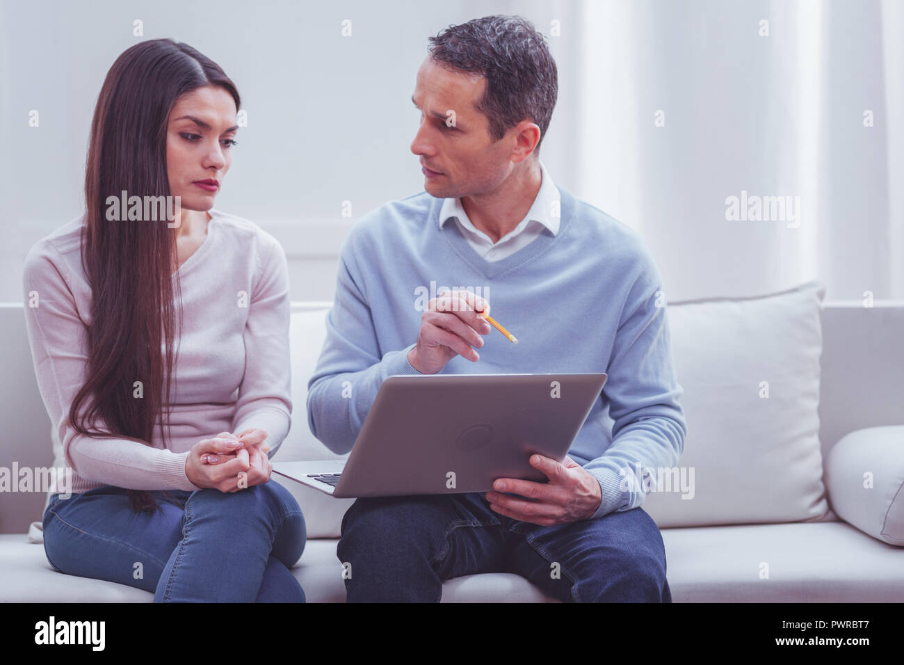 Professional manager teaching new trainee Stock Photo - Alamy