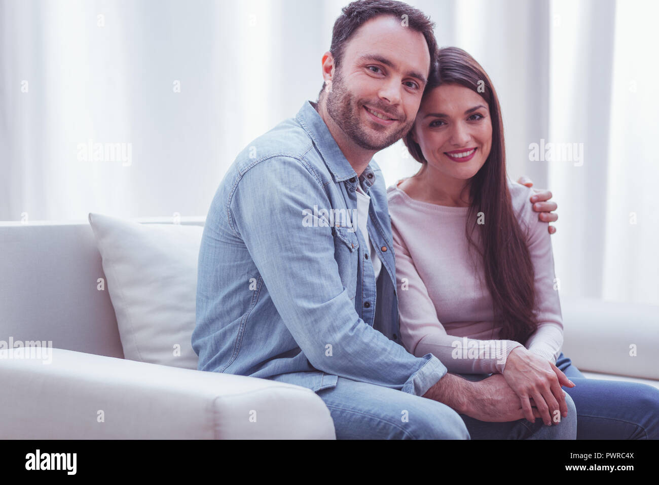 Portrait of amazing couple expressing happiness Stock Photo - Alamy