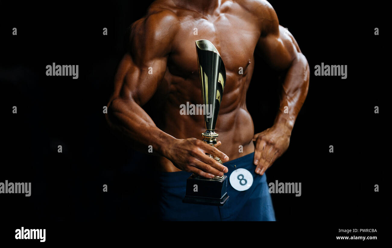 athlete bodybuilder in blue summer shorts winners of bodybuilding ...