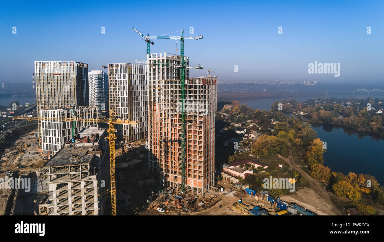 Aerial view of landscape in the city with under construction buildings ...