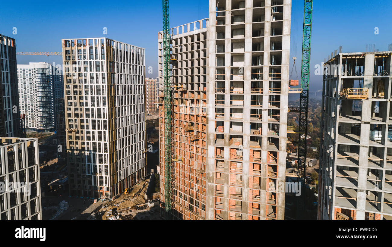 Aerial view of landscape in the city with under construction buildings ...