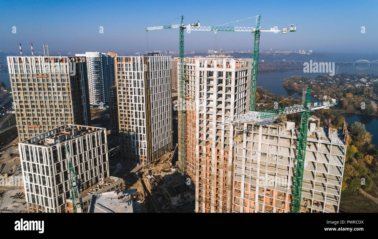 Aerial view of landscape in the city with under construction buildings ...