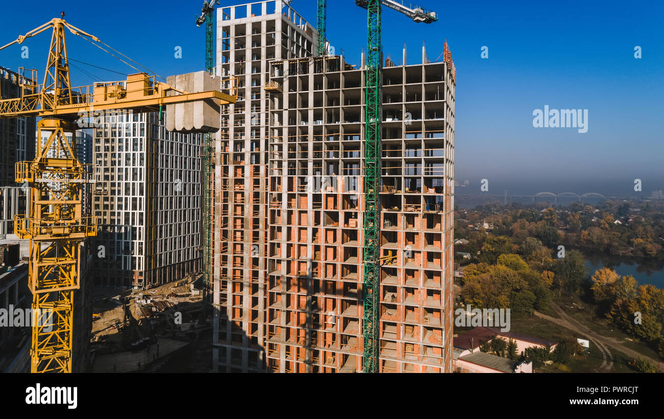 Aerial view of landscape in the city with under construction buildings ...