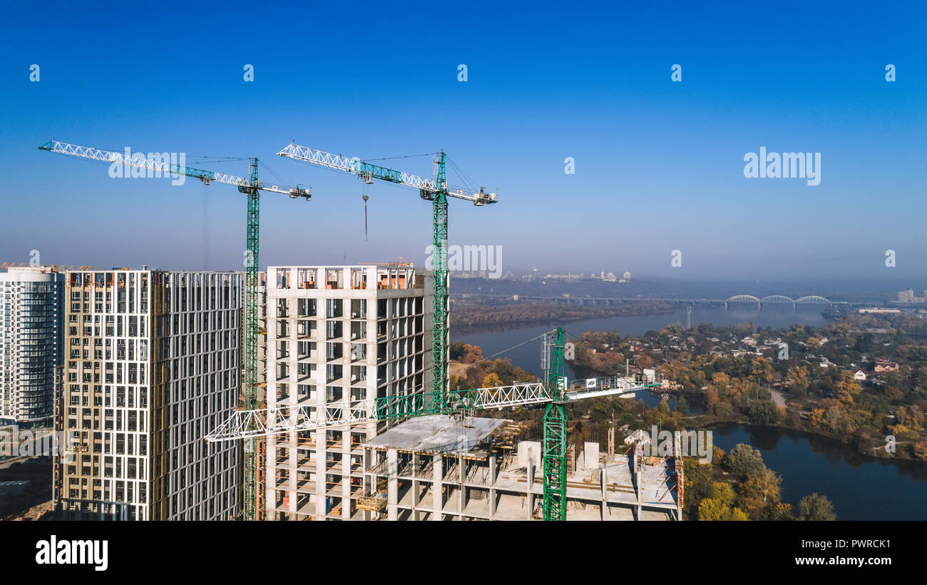 Aerial view of landscape in the city with under construction buildings ...