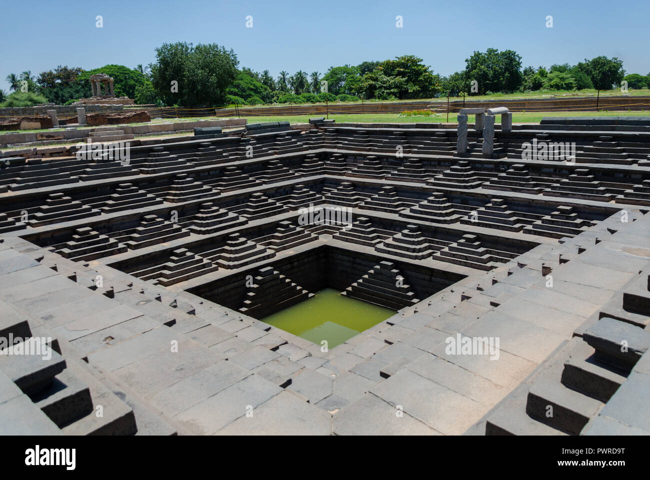 Stepped square water tank inside the Royal Enclosure at Hampi ...