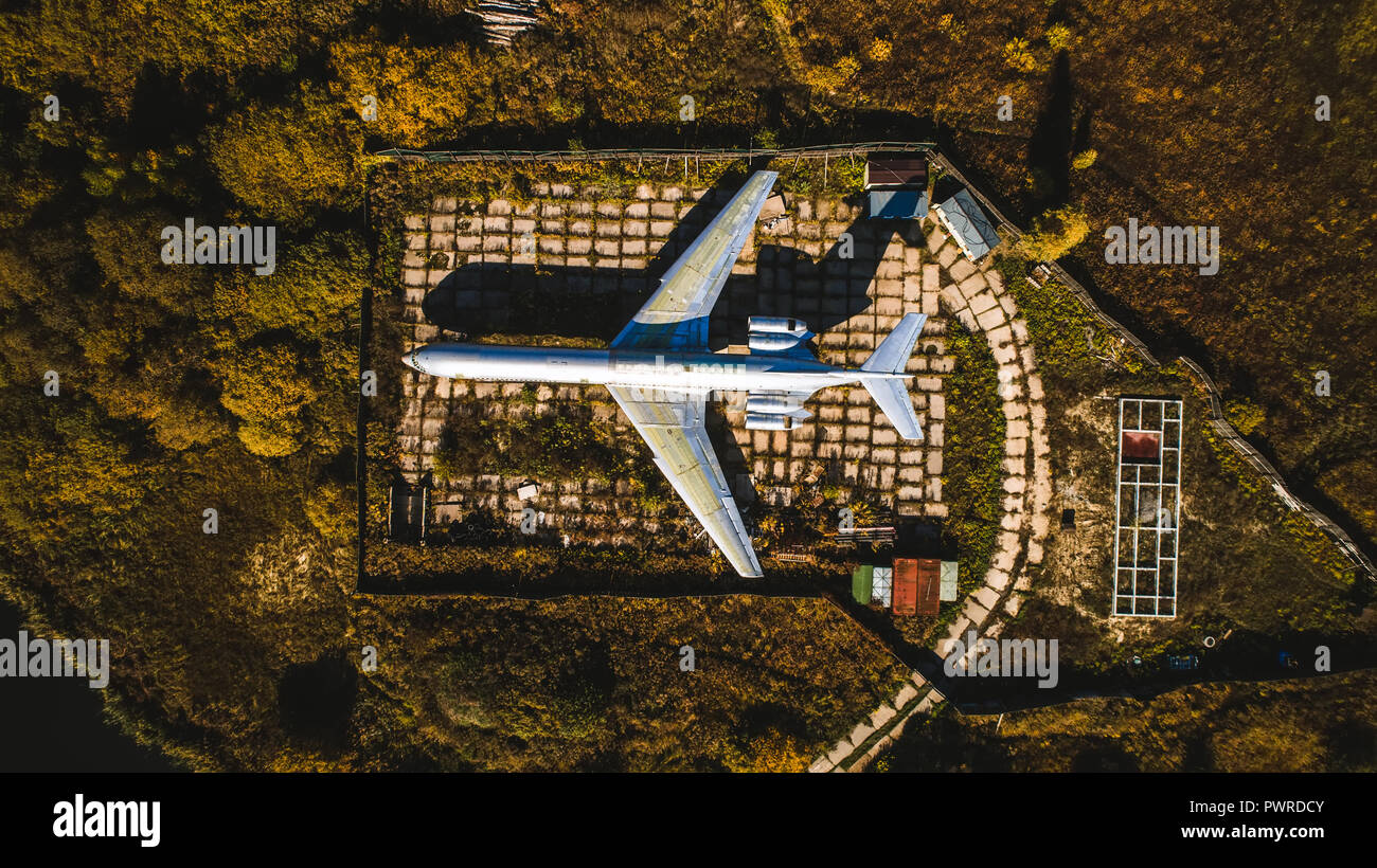 Aerial view of the plane in the autumn forest. Top view. Beautiful ...