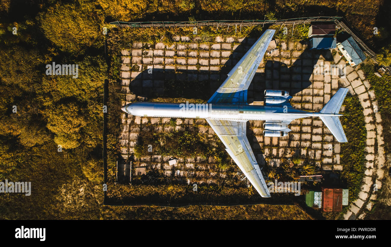 Aerial view of the plane in the autumn forest. Top view. Beautiful ...