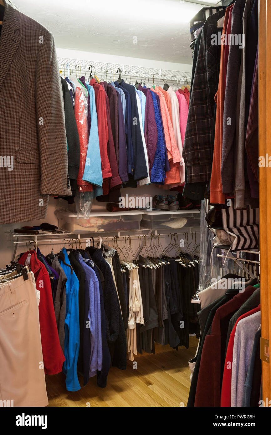 Extremely full residential walk-in closet, USA Stock Photo - Alamy