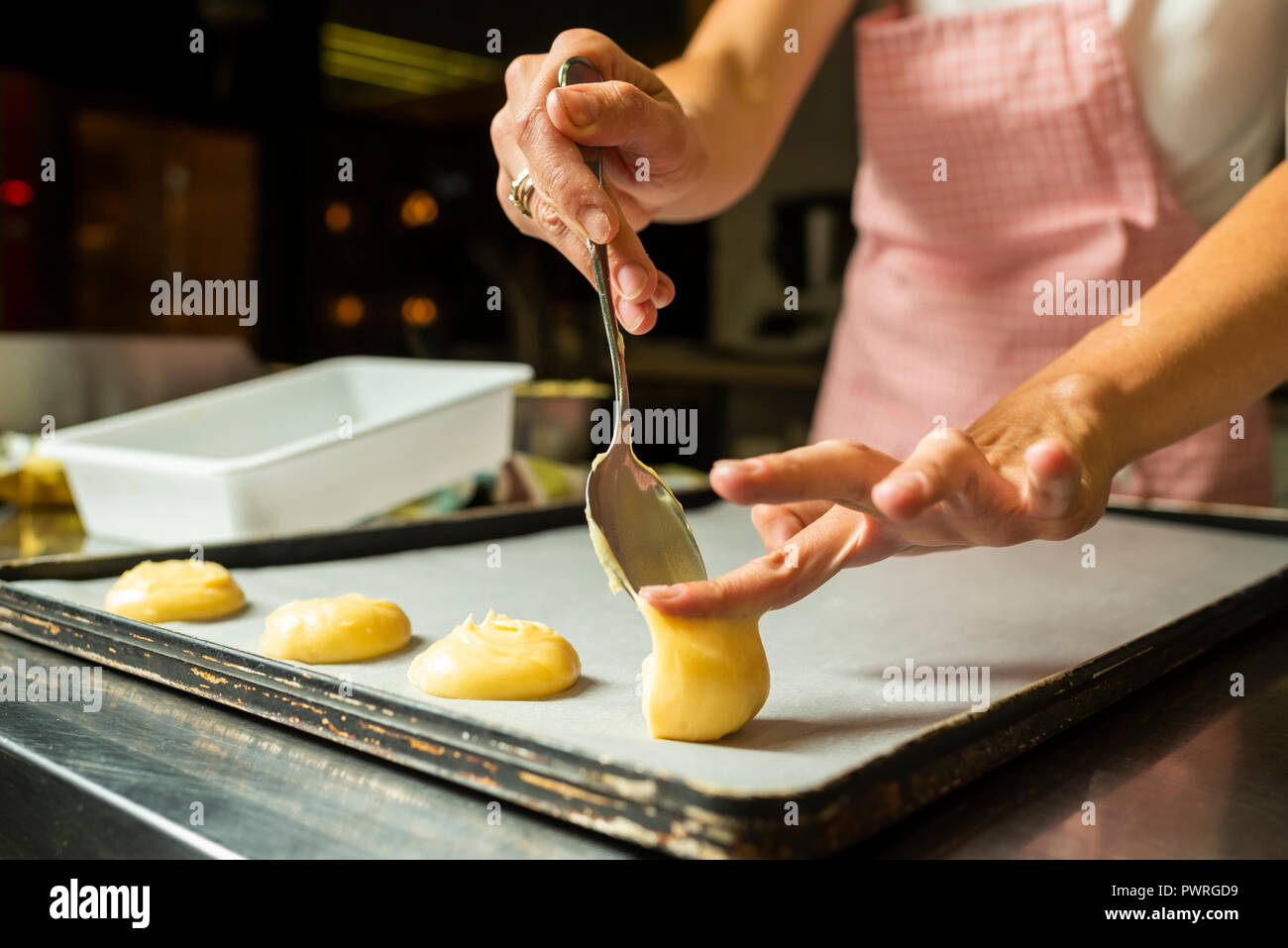 Woman cakes on a tray hi-res stock photography and images - Alamy