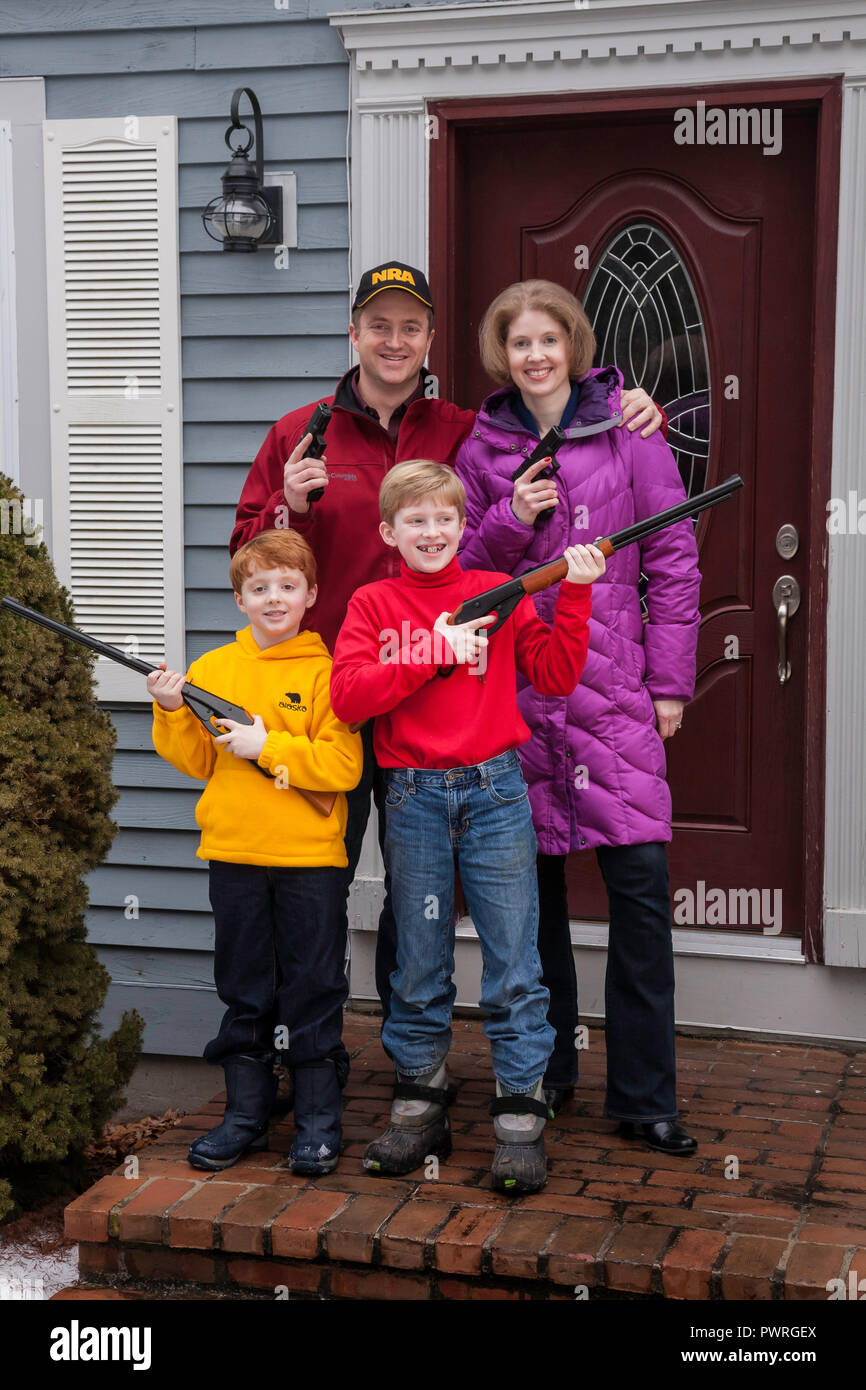 Armed family outside their home, USA 2013 Stock Photo - Alamy