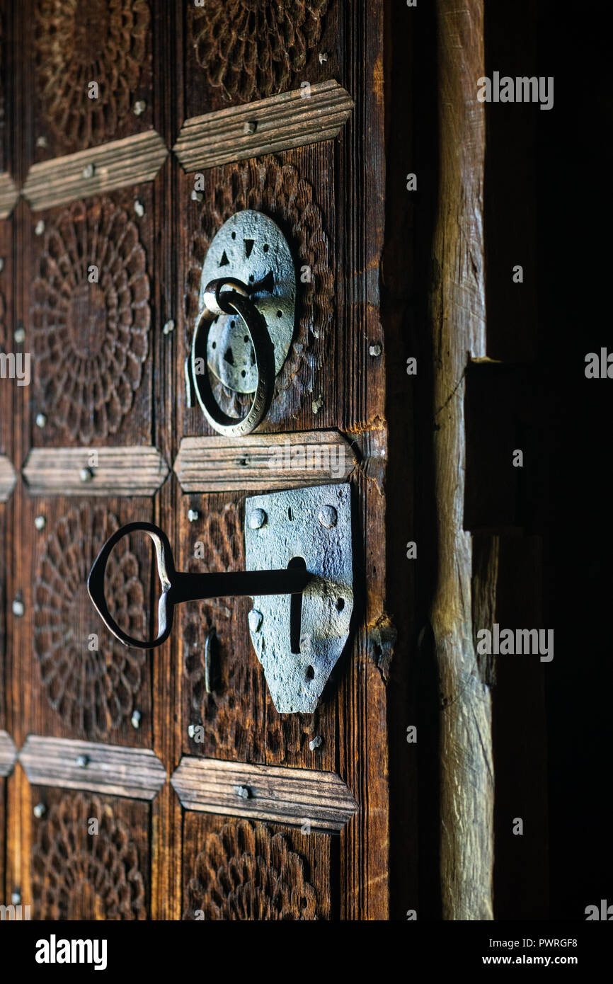 Big key in rustic door of wooden church Stock Photo - Alamy