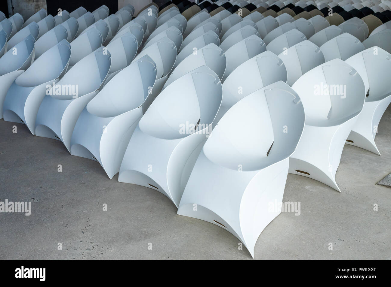 modern folding chairs for conferences and presentations Stock Photo - Alamy