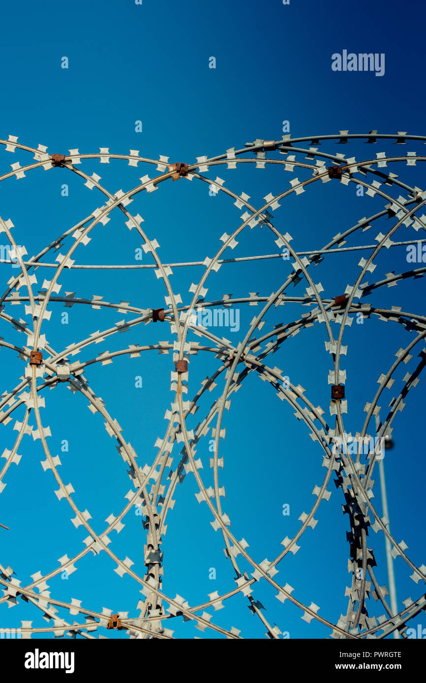 barbed wire fence used for protection purposes Stock Photo - Alamy